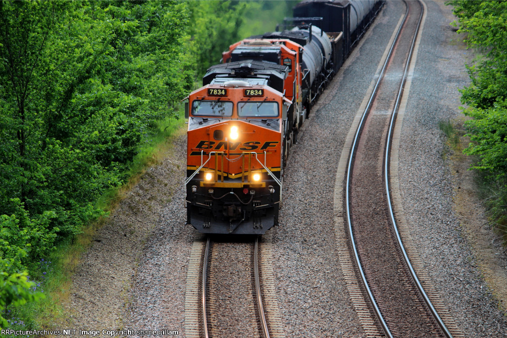 BNSF 7834 leads this M newgal with some nice power.